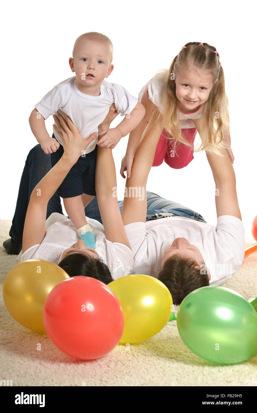 Family playing isolated on white Stock Photo - Alamy
