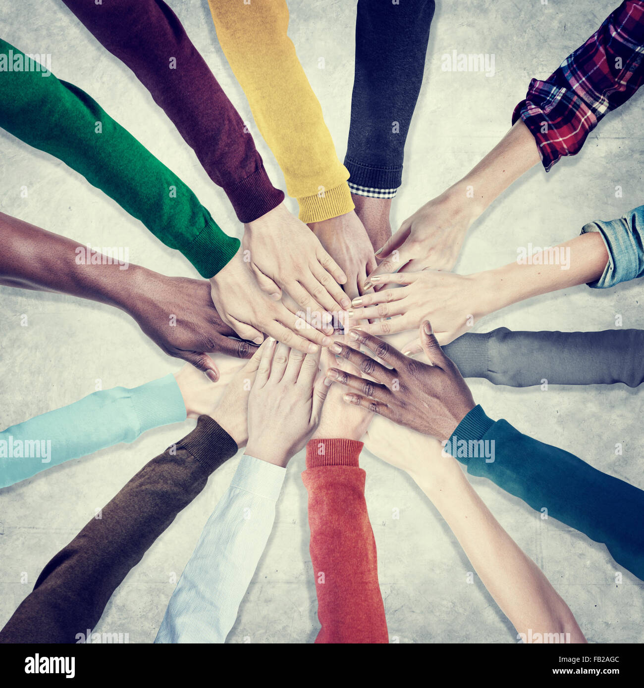 Team unity hands together hi-res stock photography and images - Alamy