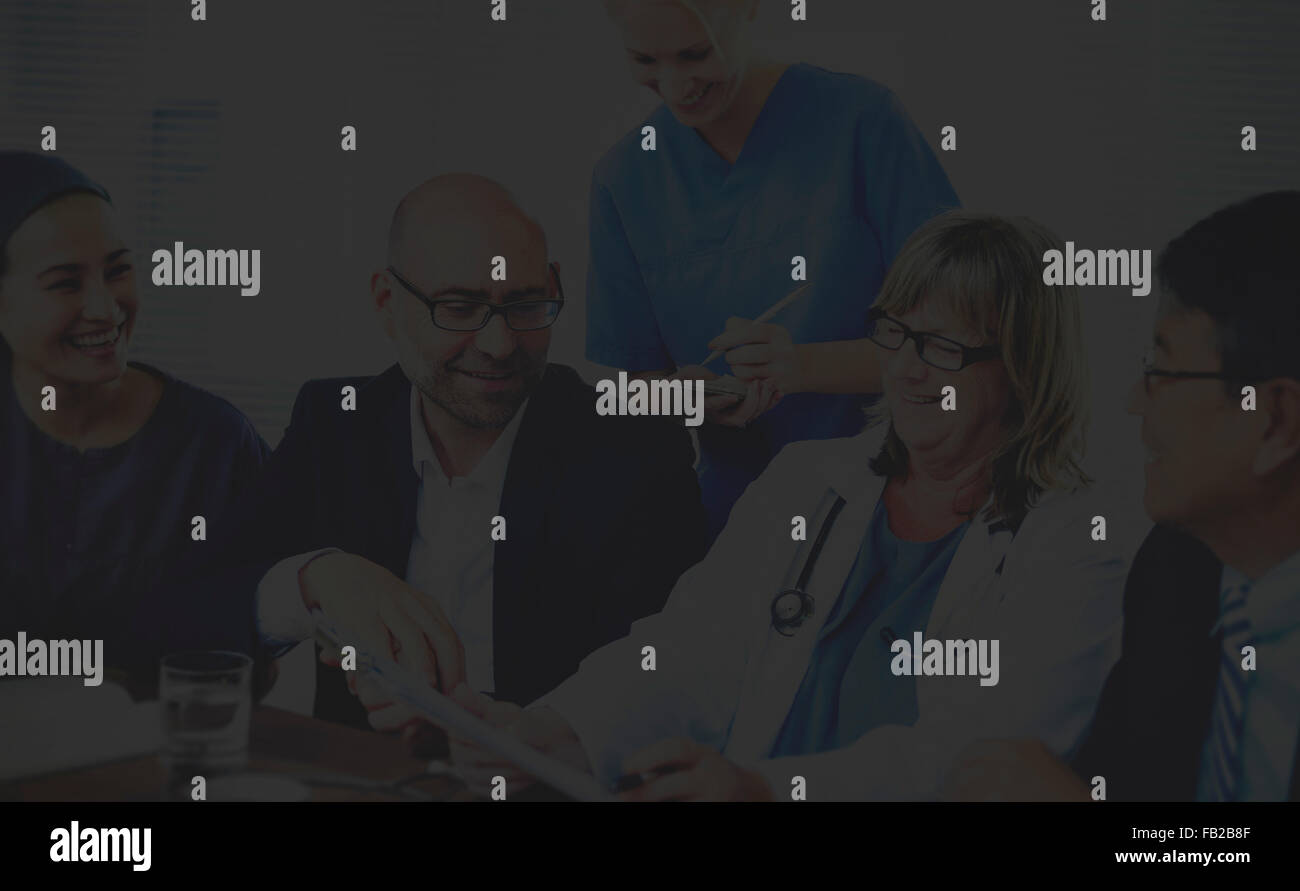 Group Of General Practitioners Having A Meeting Concept Stock Photo - Alamy