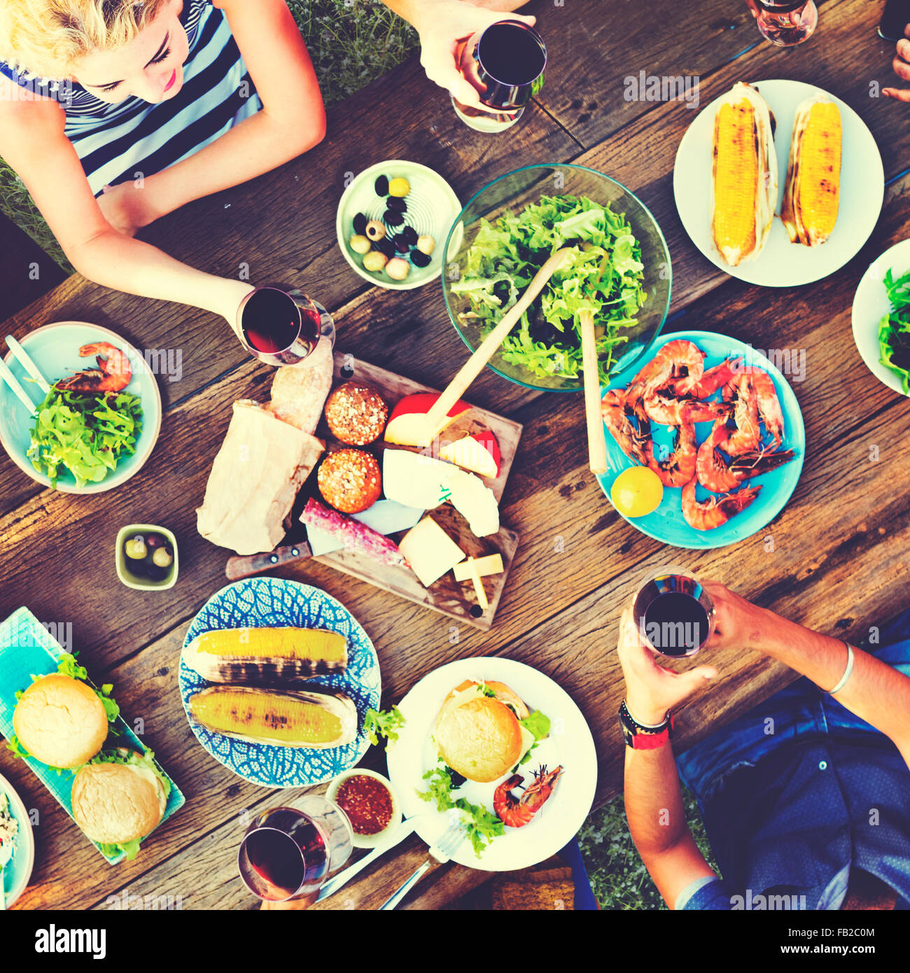 Casual People Eating Together Outdoors Concept Stock Photo - Alamy