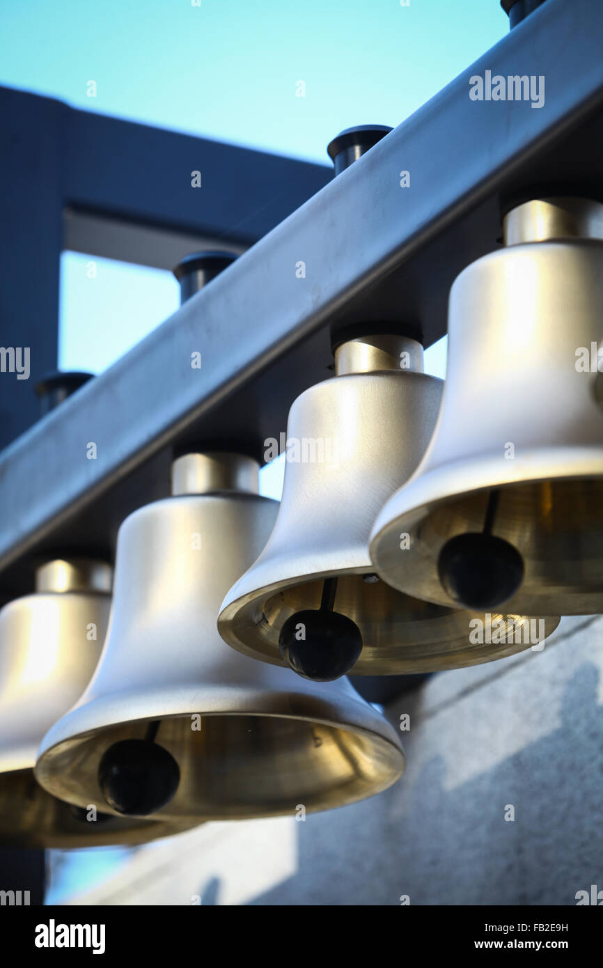 Color image of some various sized bells in a row Stock Photo - Alamy