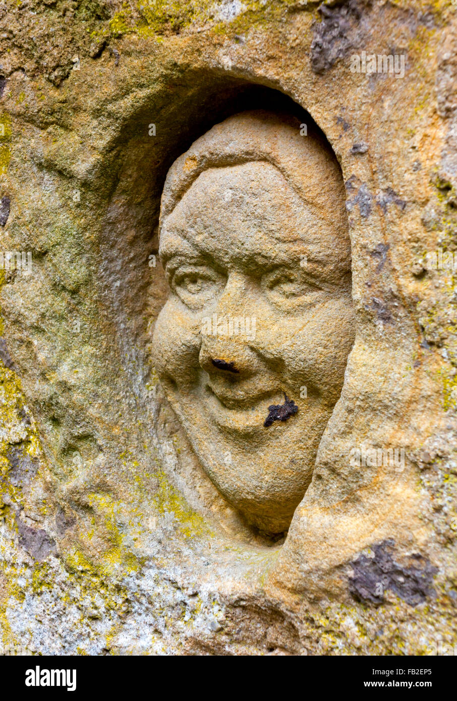 Gargoyle in wall at Belsay Castle a 14th-century medieval castle in ...