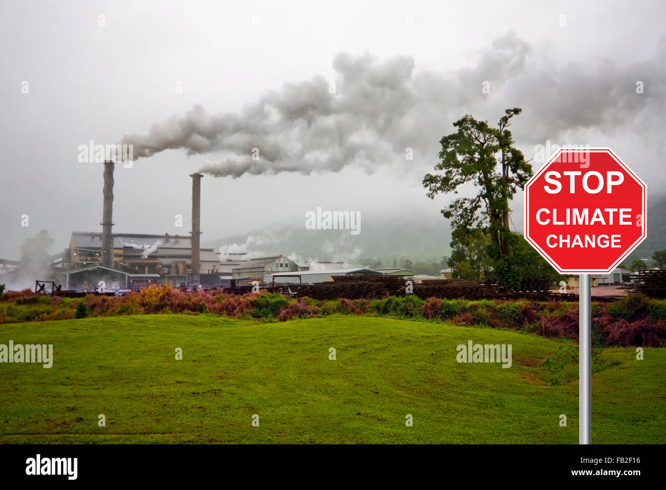 factory with smog and stop sign Stock Photo - Alamy