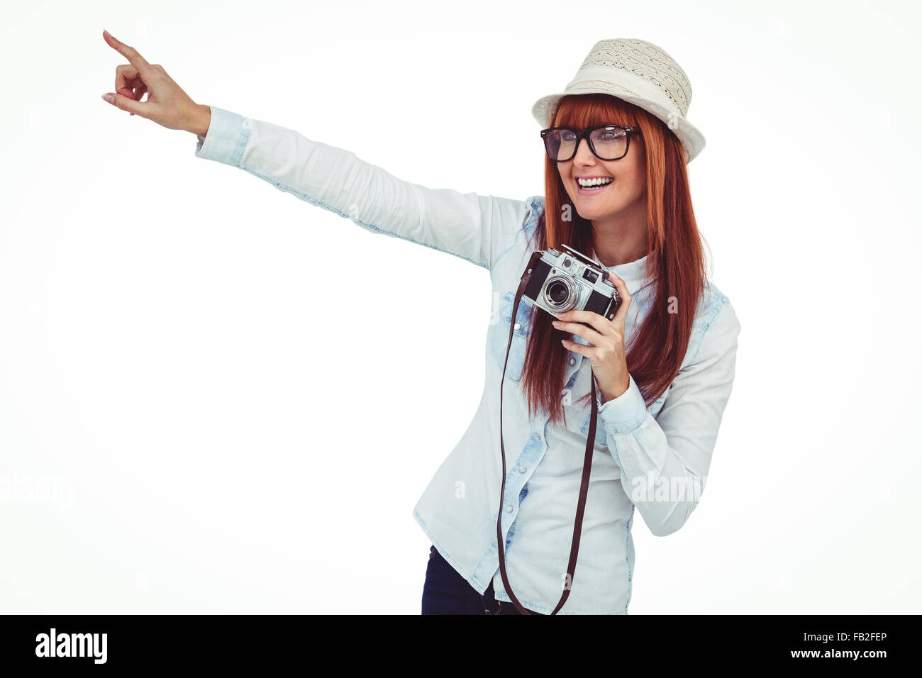 Attractive hipster photographing with camera Stock Photo - Alamy