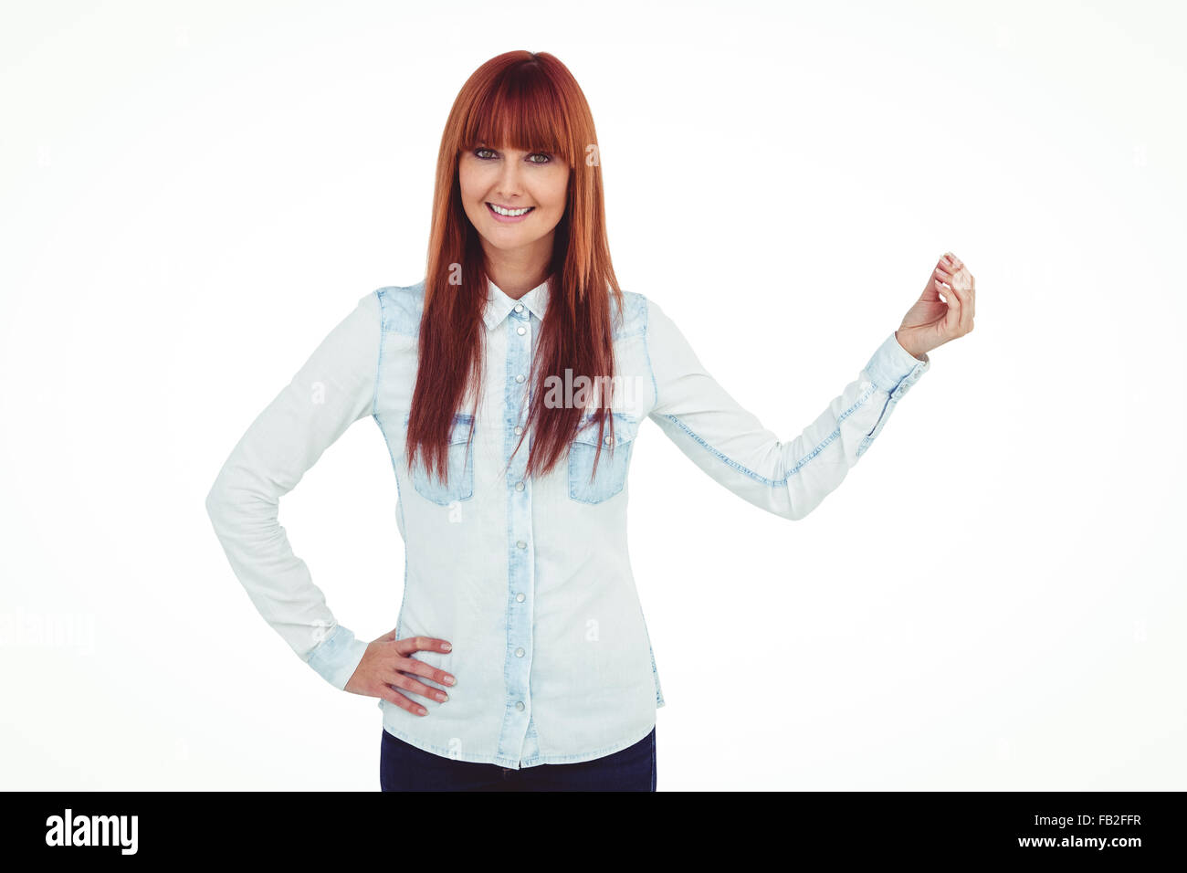 Smiling hipster woman with hands on hips Stock Photo - Alamy