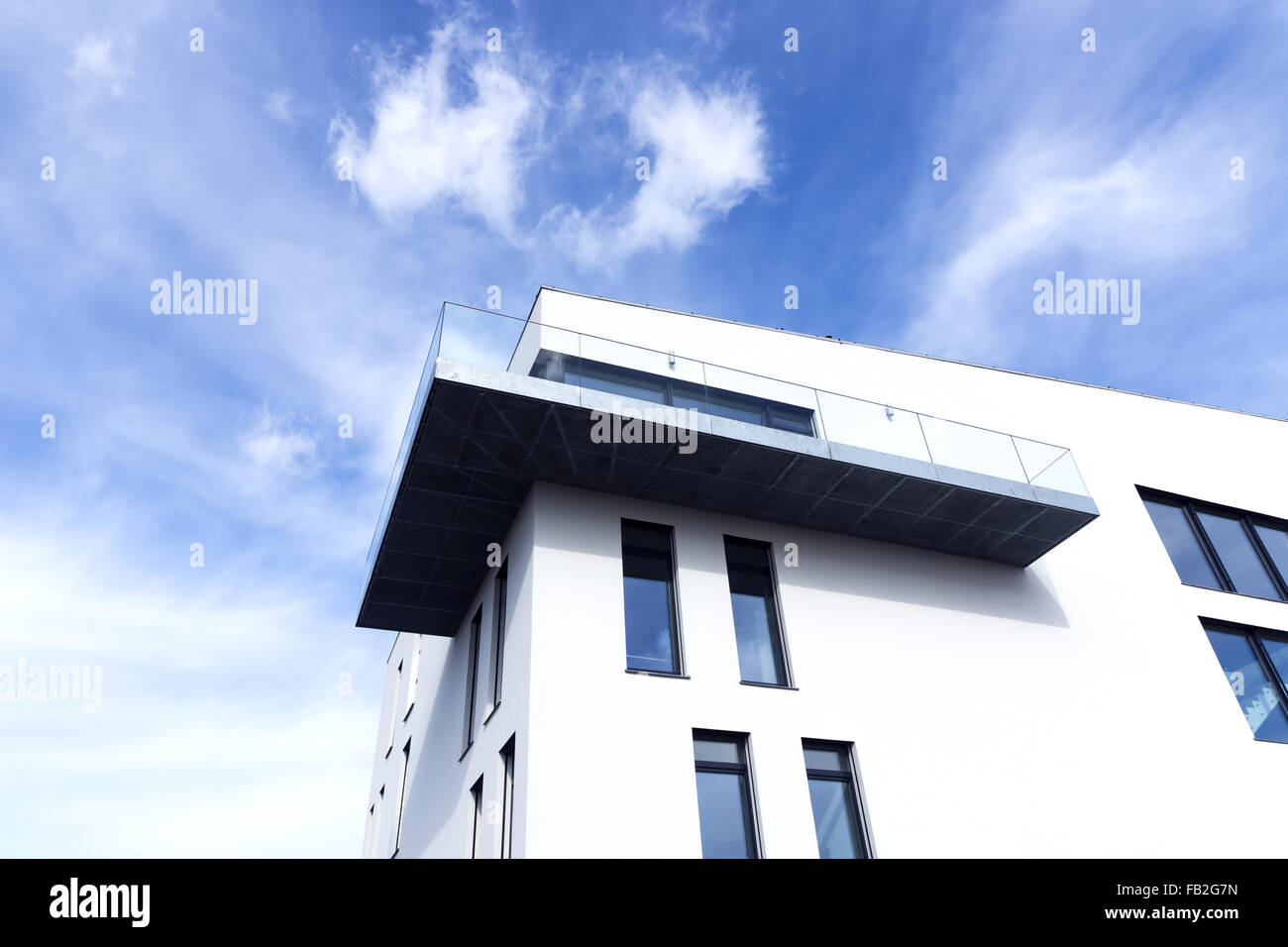 Passive modern building with a balcony on a sunny day Stock Photo - Alamy