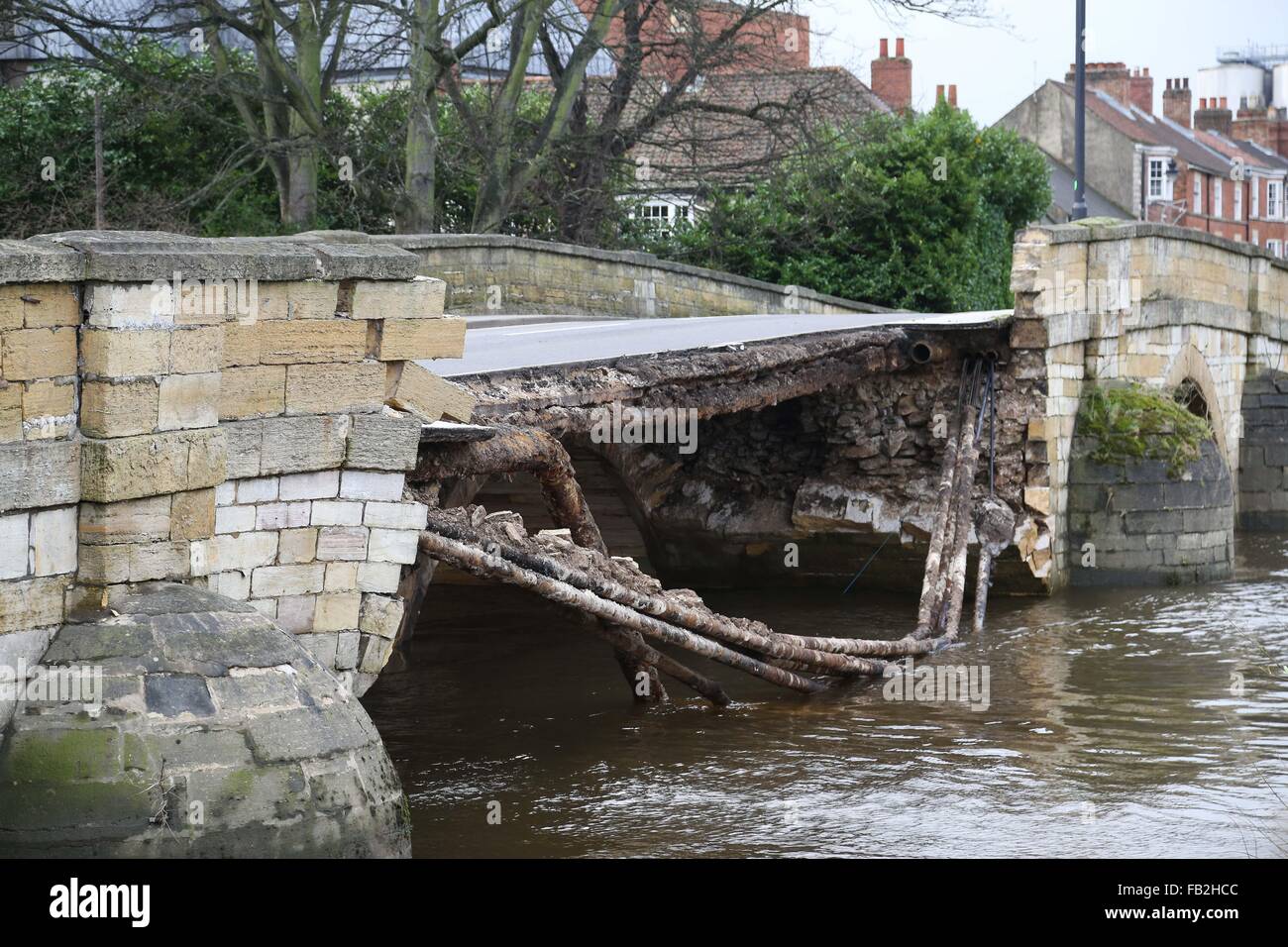 The damaged bridge in Tadcaster, North Yorkshire, caused by the rising ...