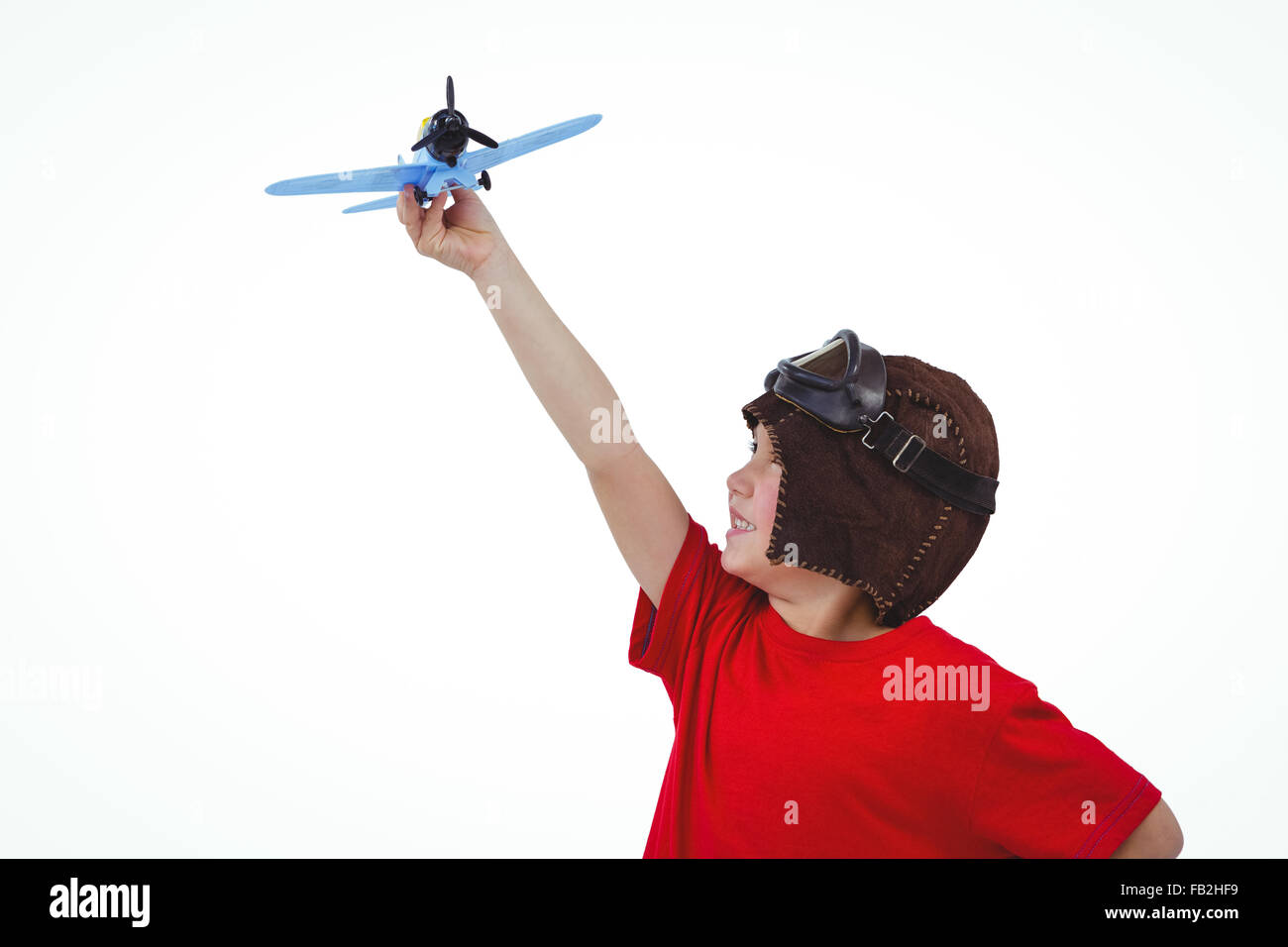 Boy playing with toy airplane Stock Photo - Alamy