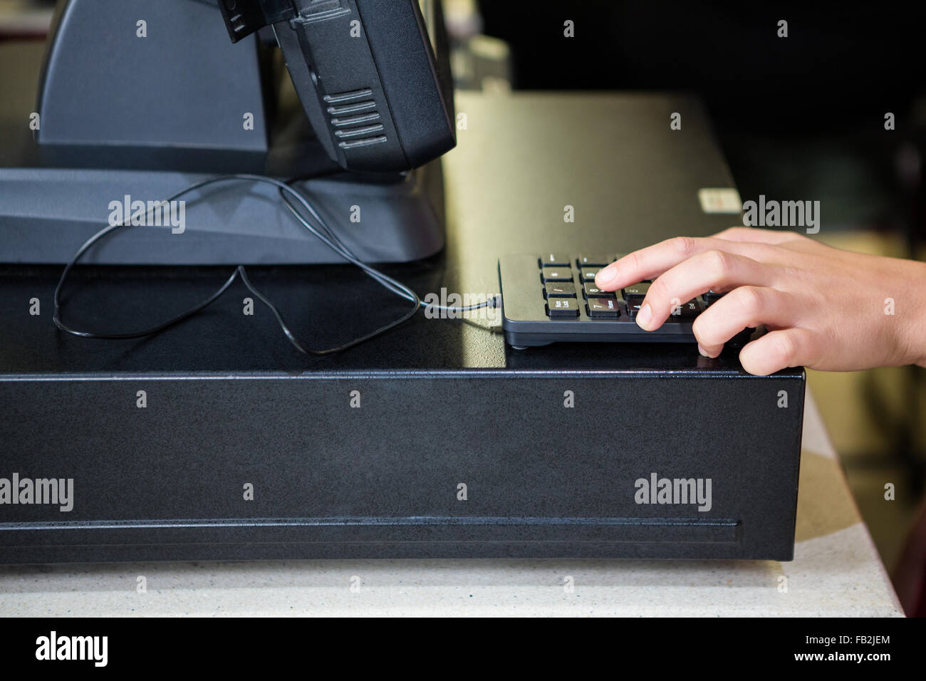 Hand with calculator hi-res stock photography and images - Alamy