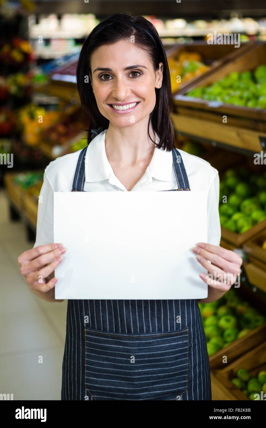 Woman holding happy sign hi-res stock photography and images - Alamy