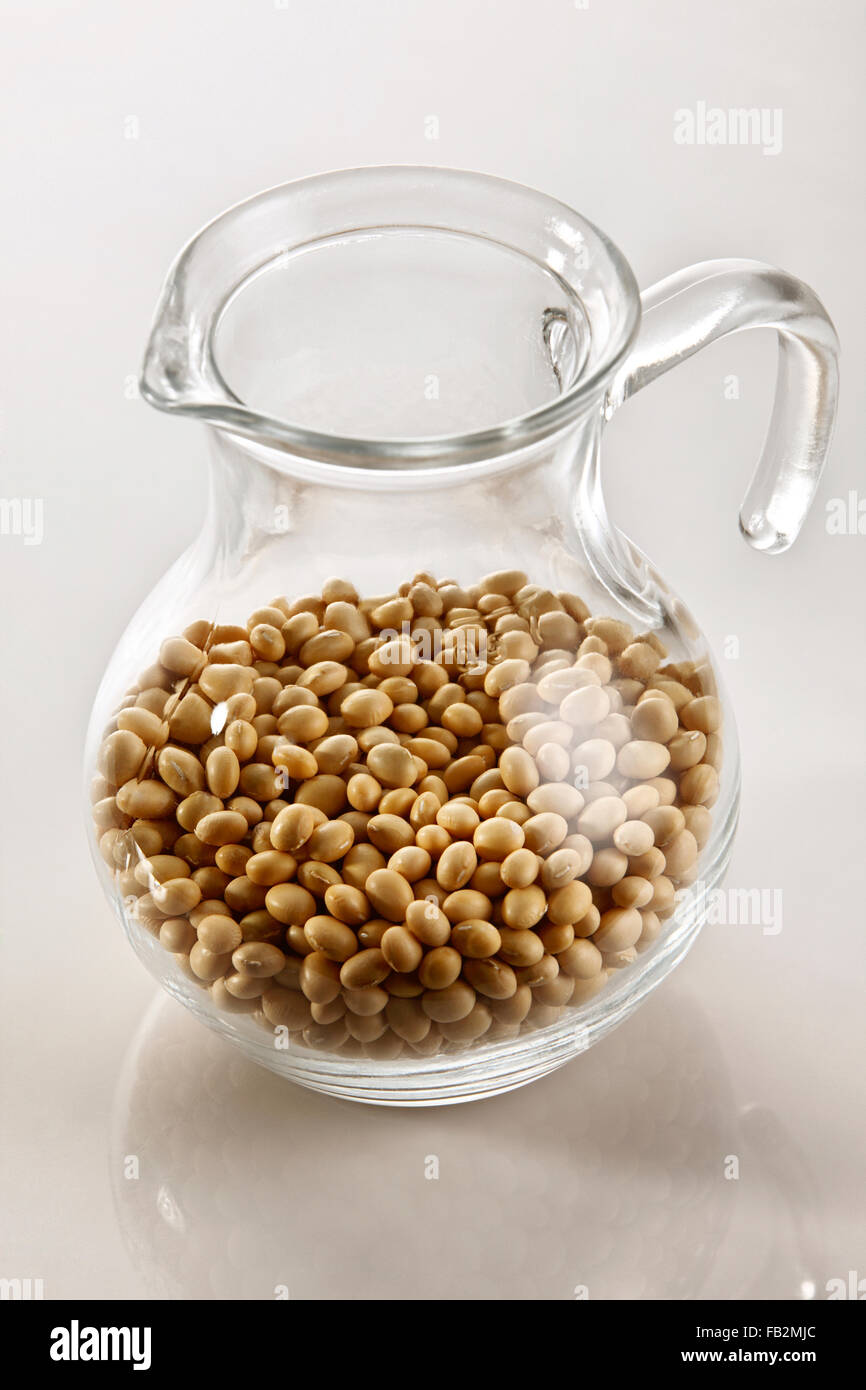 jar with the soy bean on the plain background Stock Photo - Alamy