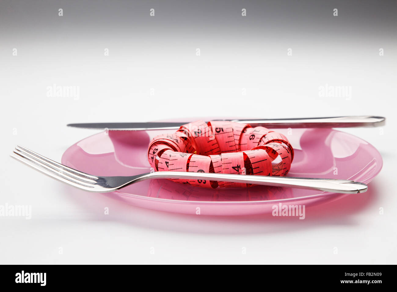 stock image of the donut form by measuring tape Stock Photo - Alamy