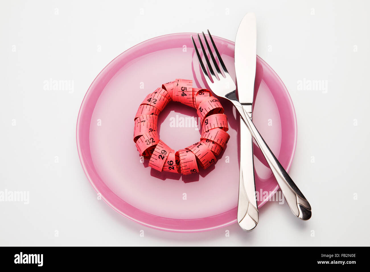 stock image of the donut form by measuring tape Stock Photo - Alamy