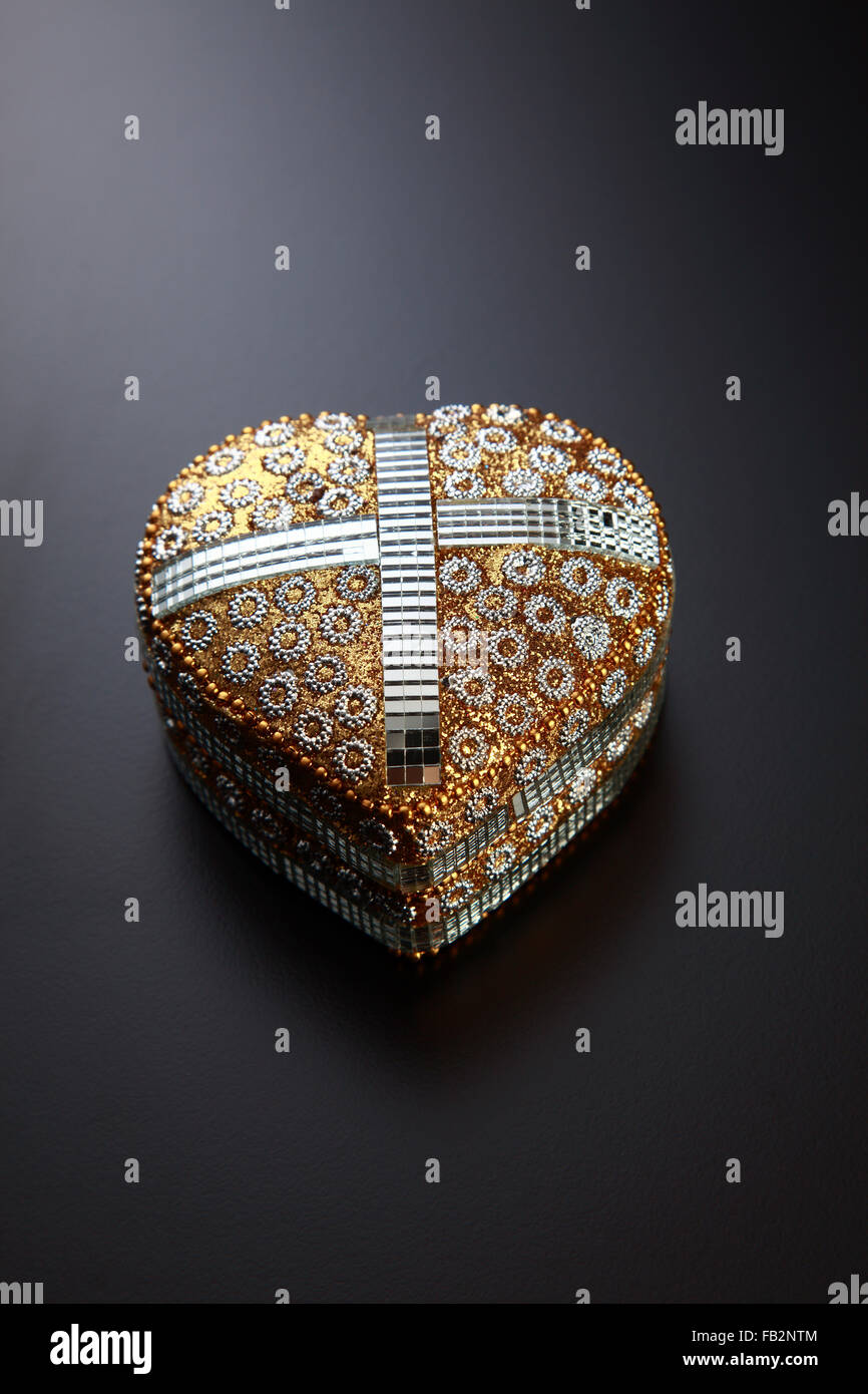 heart shape gift box on the black Stock Photo - Alamy