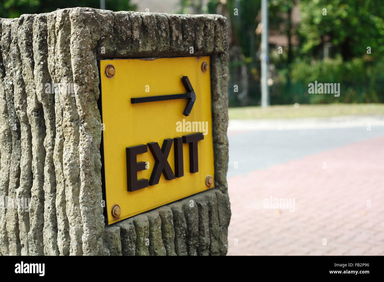 yellow exit sign on the road side Stock Photo - Alamy