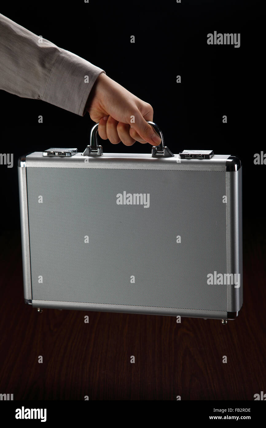 man holding a brief case Stock Photo - Alamy