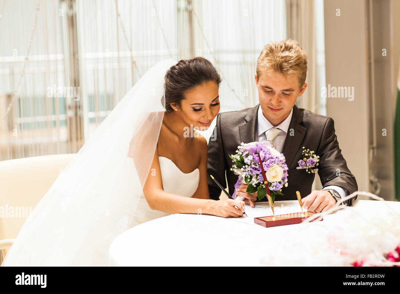 Signing marriage license hi-res stock photography and images - Alamy