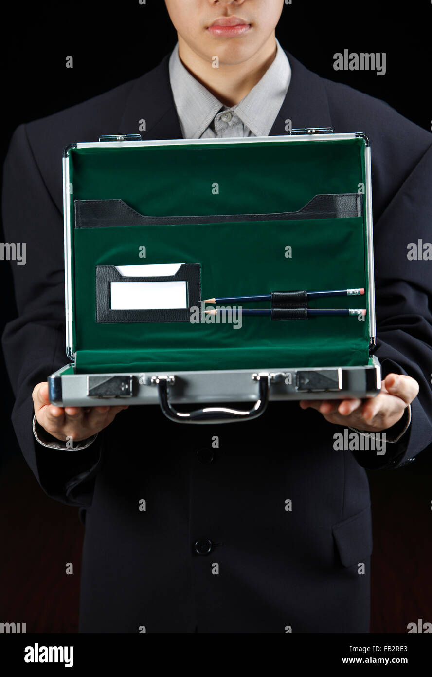 junior showing an open brief case Stock Photo - Alamy