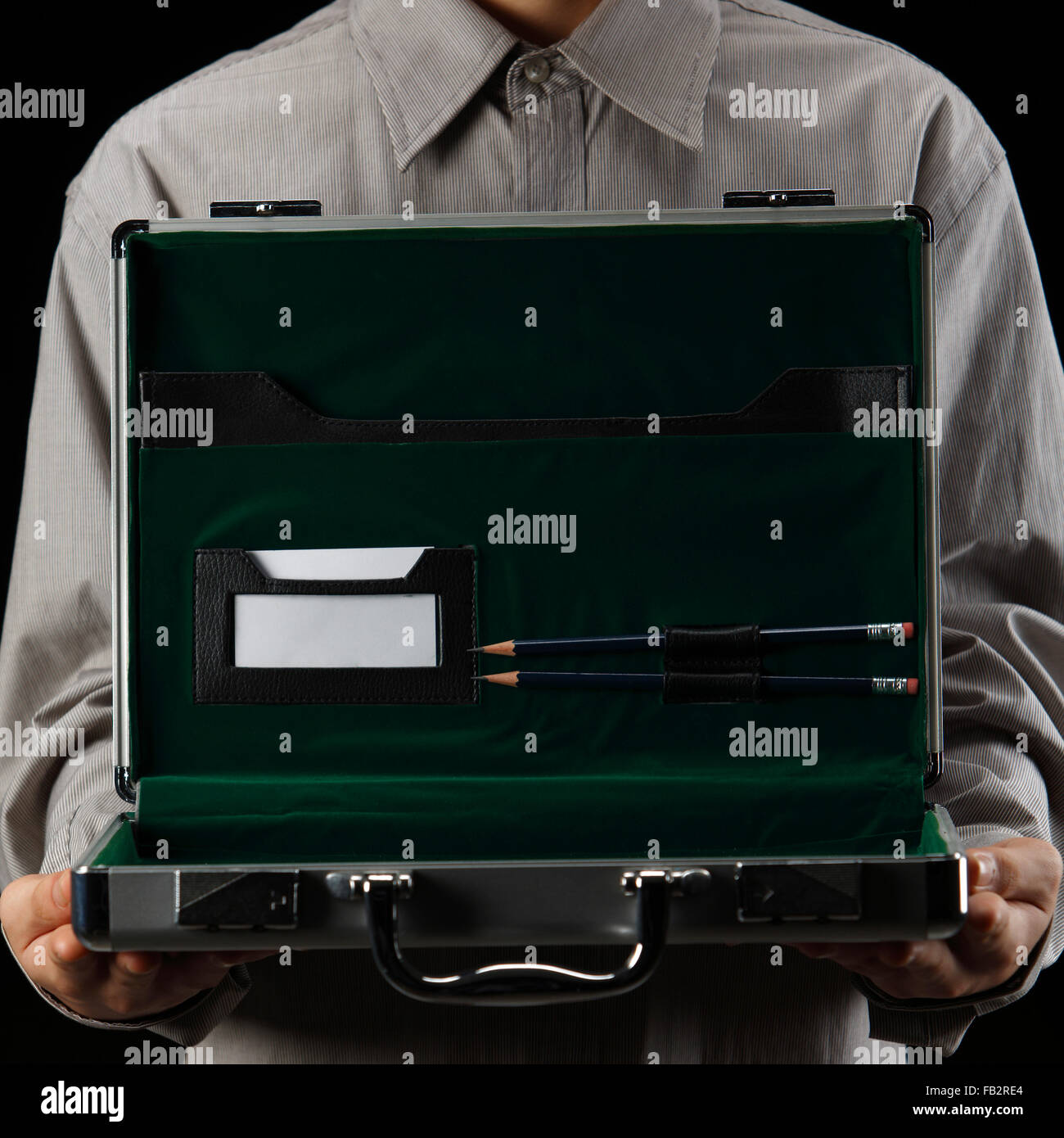 man showing an open brief case Stock Photo - Alamy