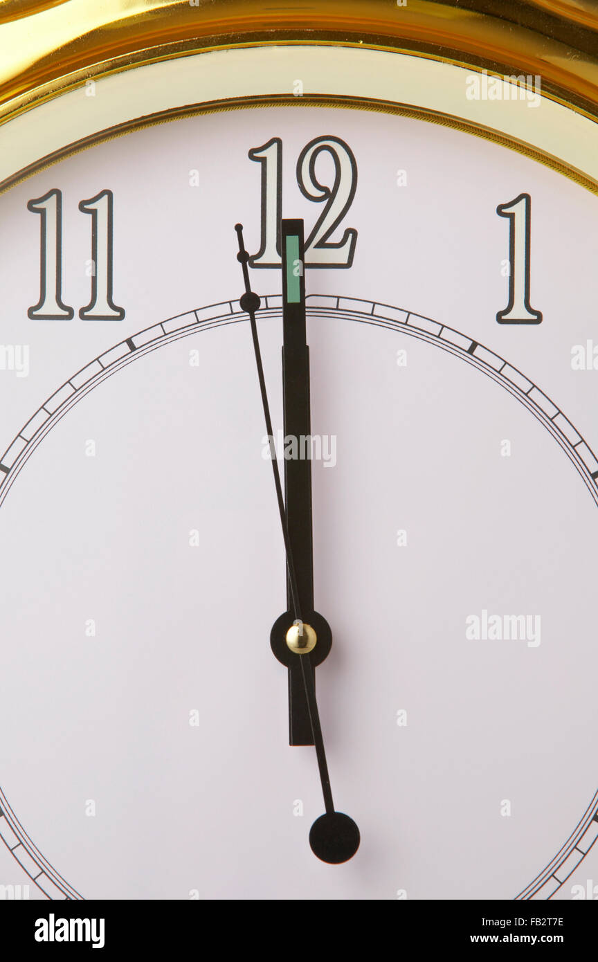 close up the clock going to tb twelve o'clock Stock Photo - Alamy