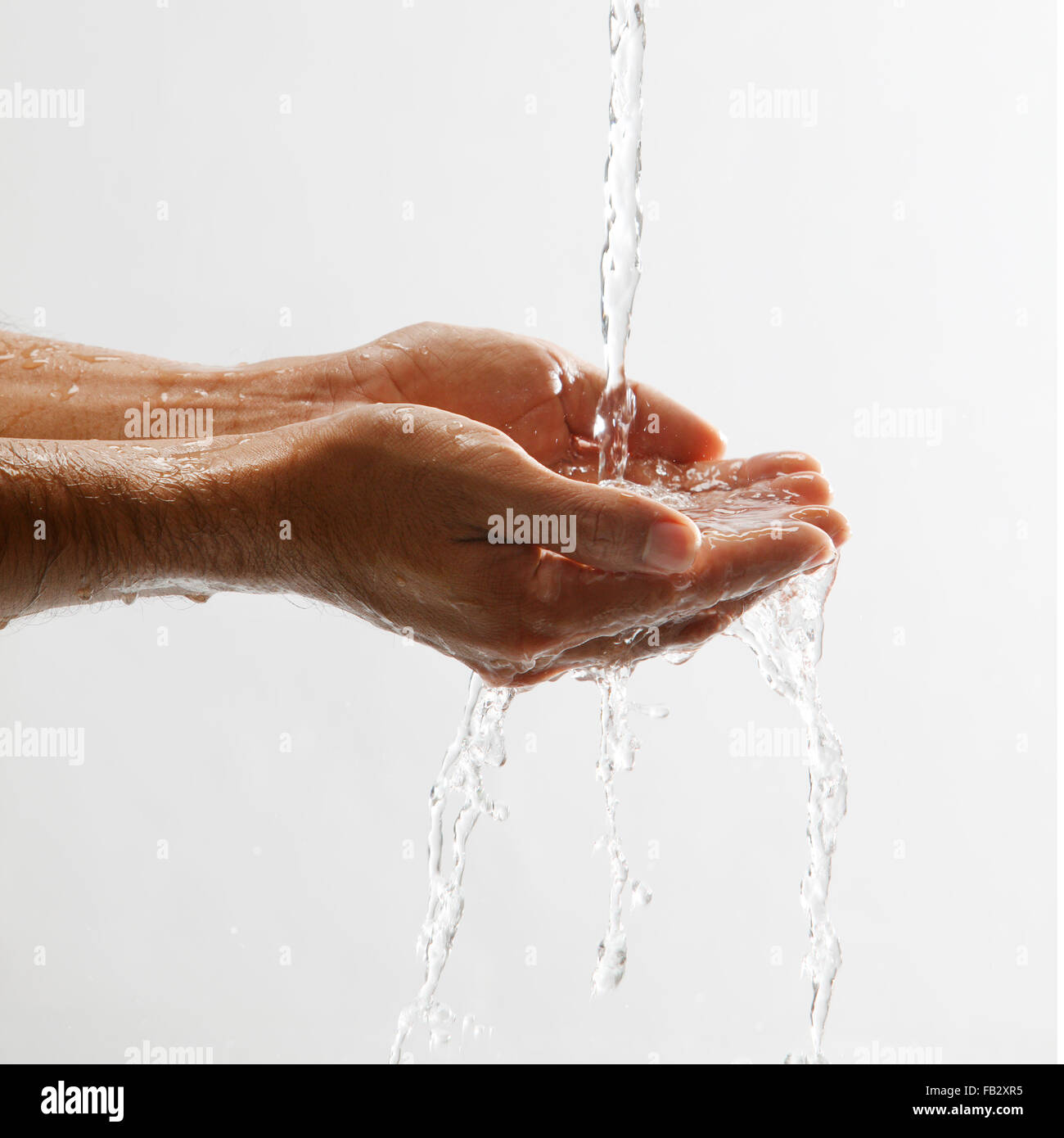 Water pouring cupped human hand hi-res stock photography and images - Alamy