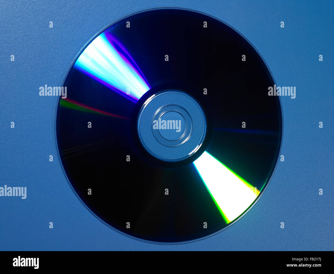 close up of the single cd on the blue background Stock Photo - Alamy