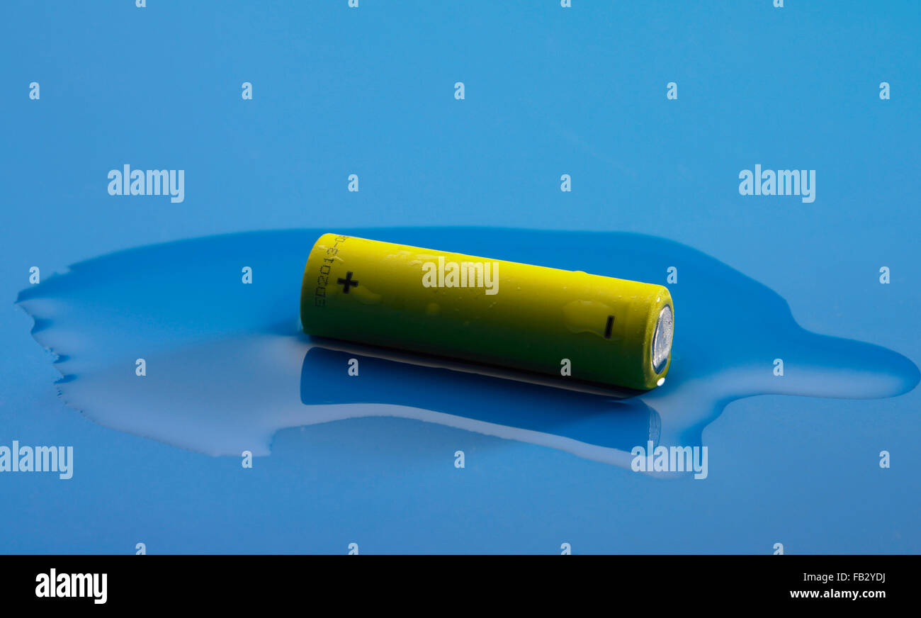 battery and water reflection on the blue background Stock Photo - Alamy