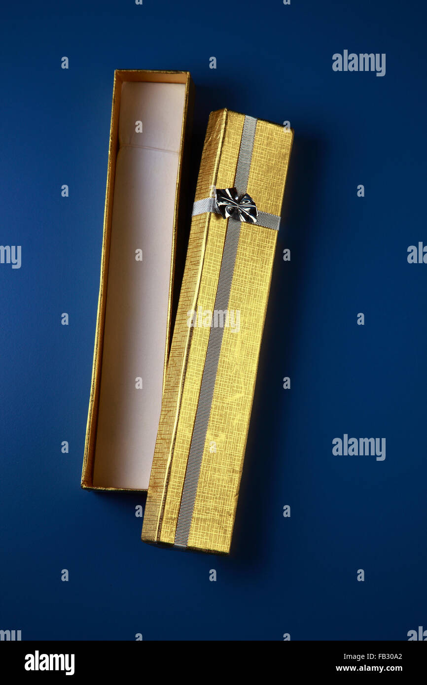 opened yellow or golden color gift box Stock Photo - Alamy