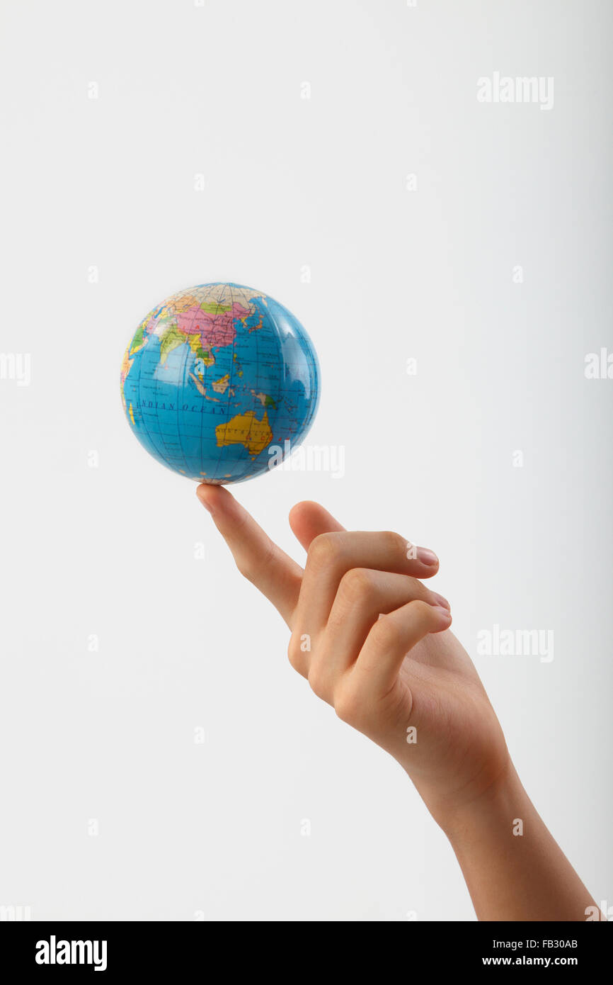Balancing earth globe hi-res stock photography and images - Alamy