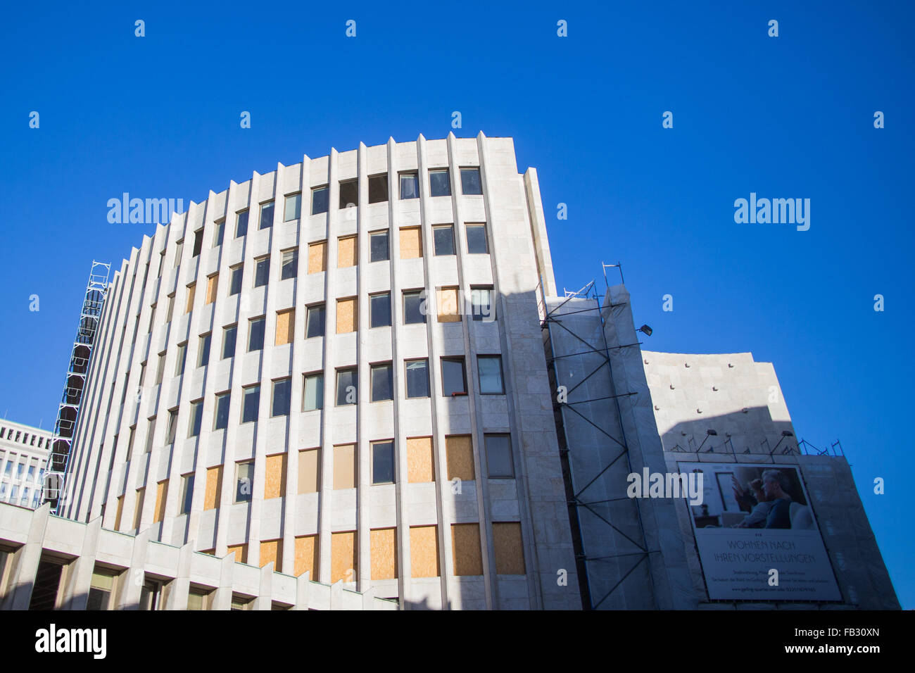 A poster advertises homes and offices at the former headquarters of the ...
