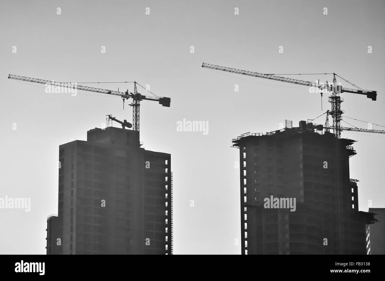 Two building tower crane in hi-res stock photography and images - Alamy