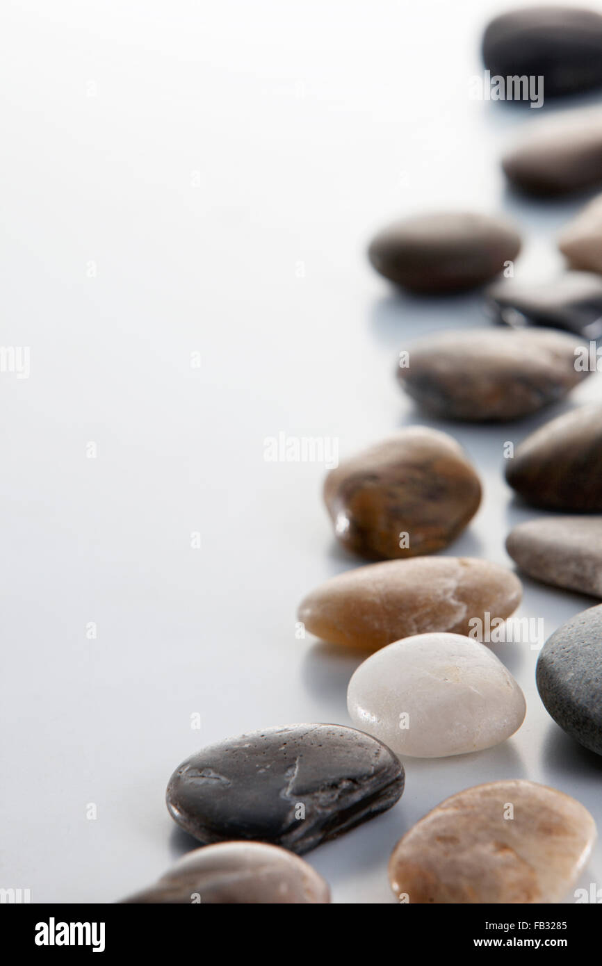 River Stone Background on the plainn background Stock Photo - Alamy