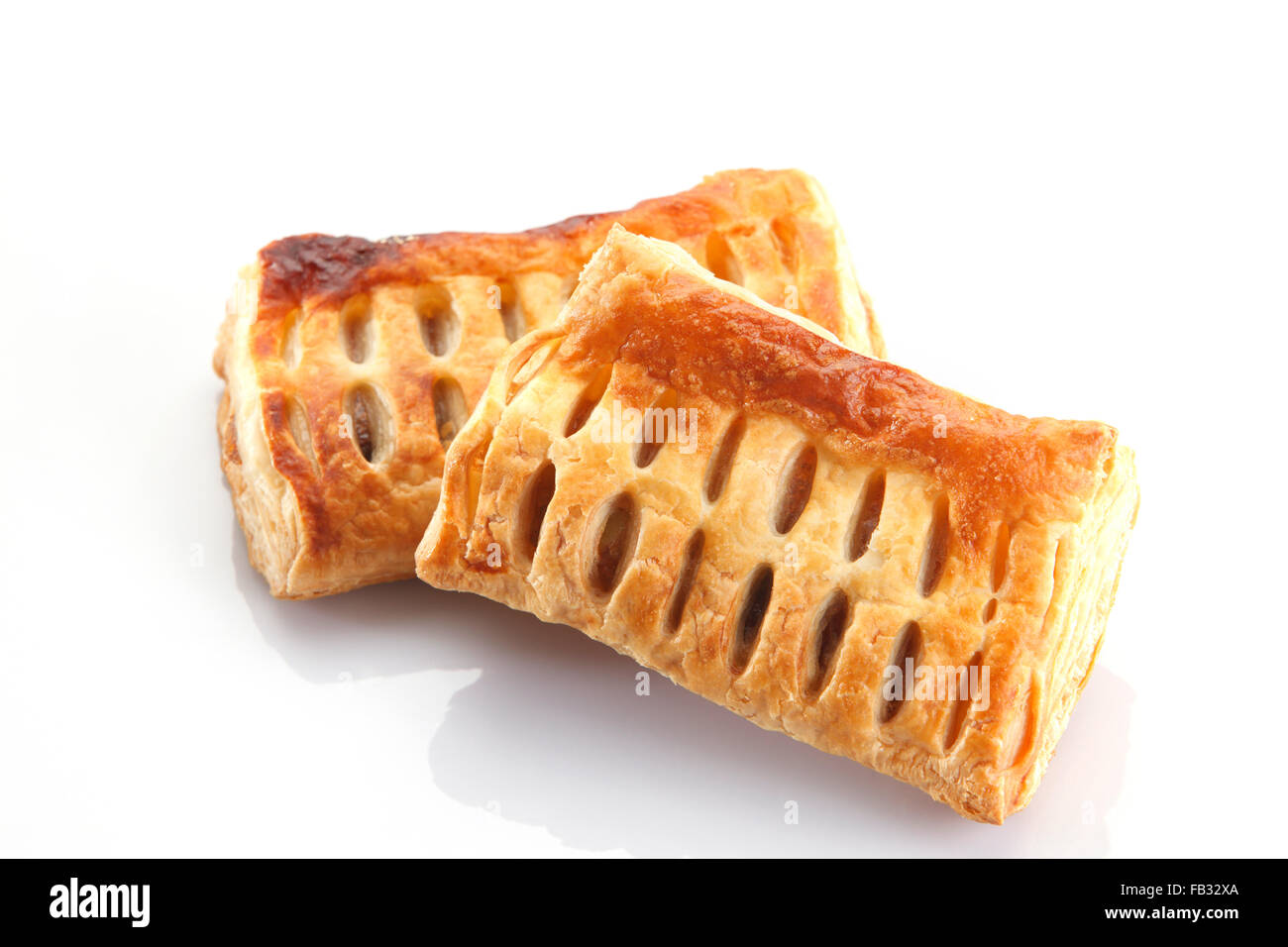 Apple puffs on the plain background Stock Photo - Alamy