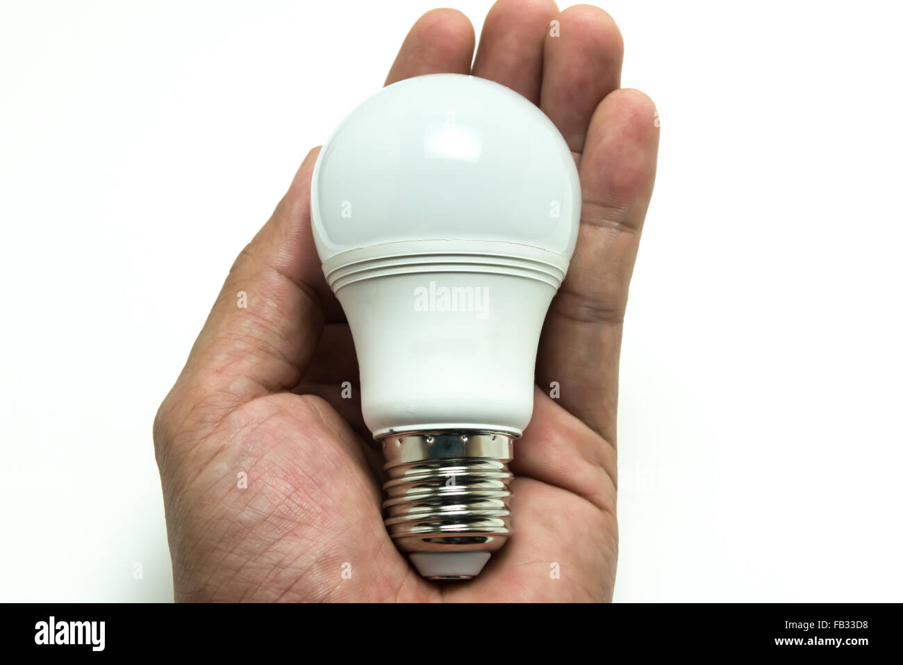 light bulb in hand Stock Photo - Alamy