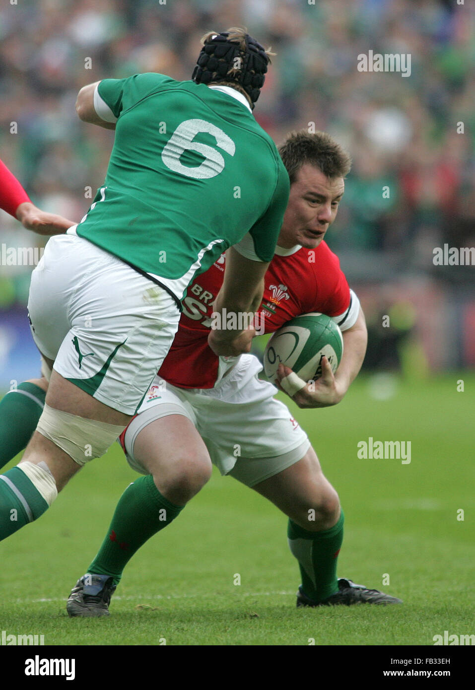 Ireland's Stephen Ferris blocks Wales Matthew Rees in the Six Nations ...