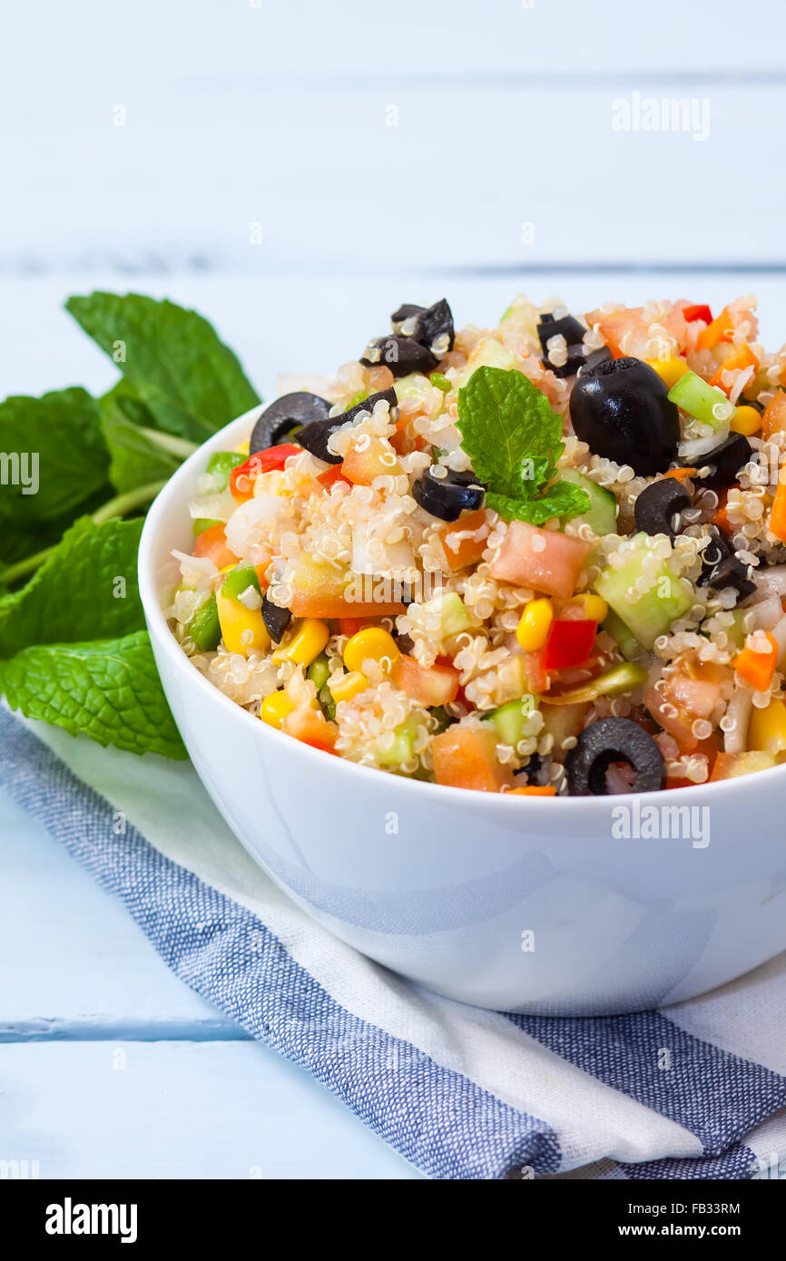 fresh quinoa salad taboule style with vegetables on bowl Stock Photo ...