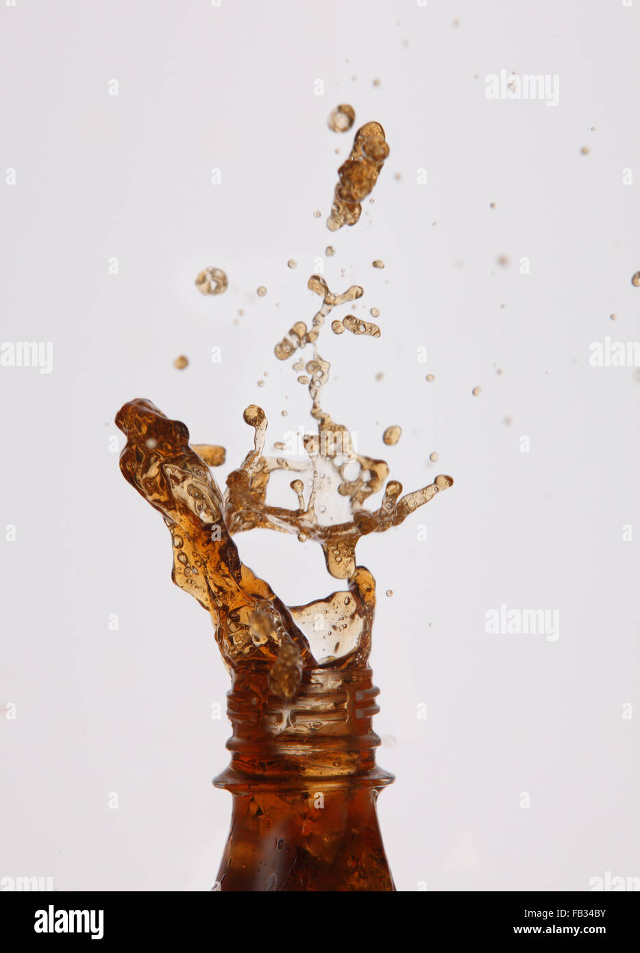 soda splash out from bottle Stock Photo - Alamy