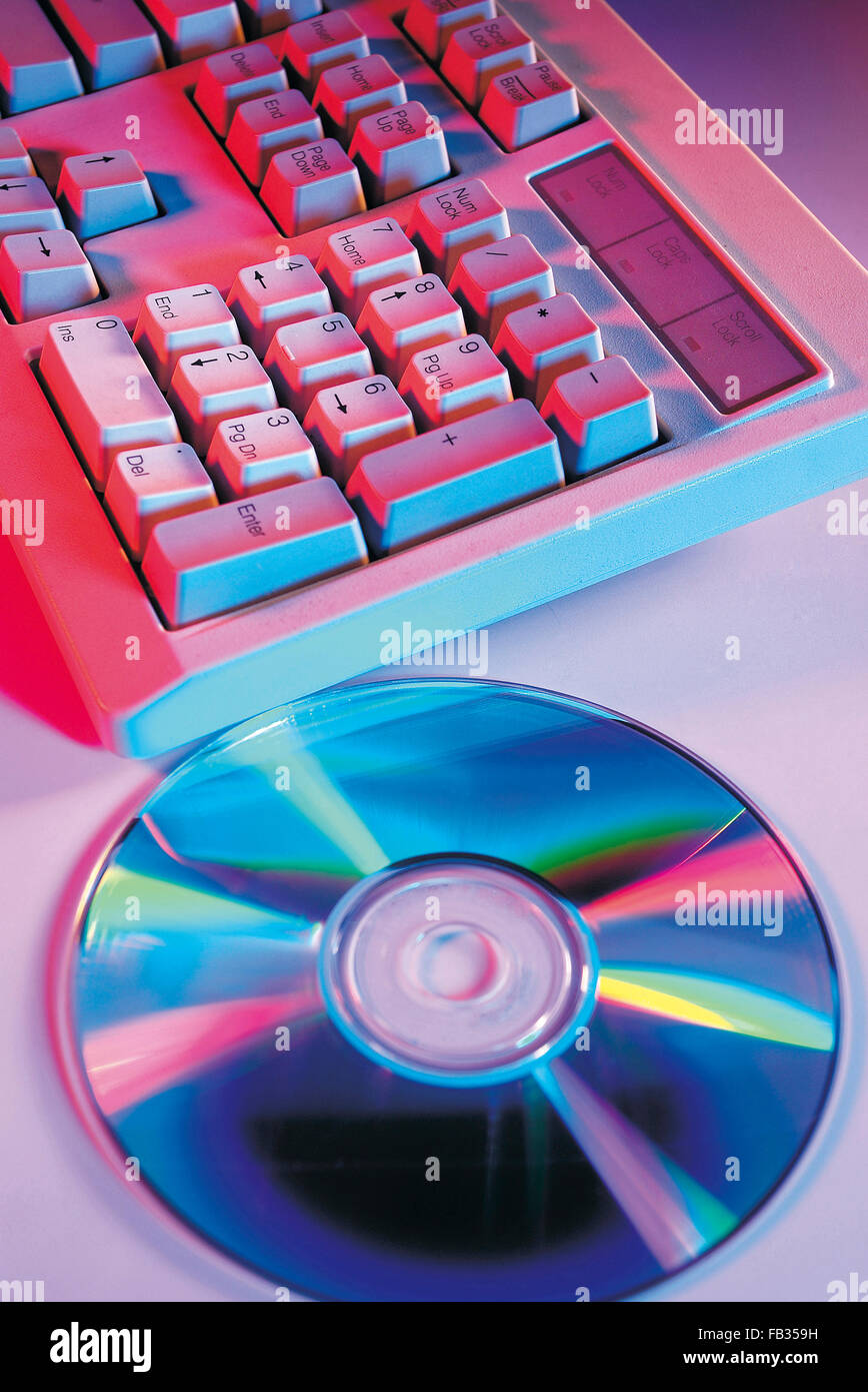 Compact disk with a keyboard Stock Photo - Alamy