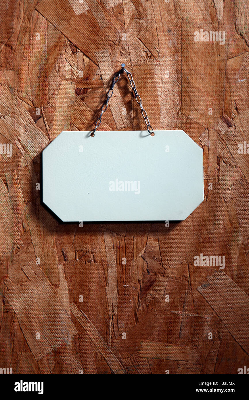 metal signage with string on the texture wood Stock Photo - Alamy