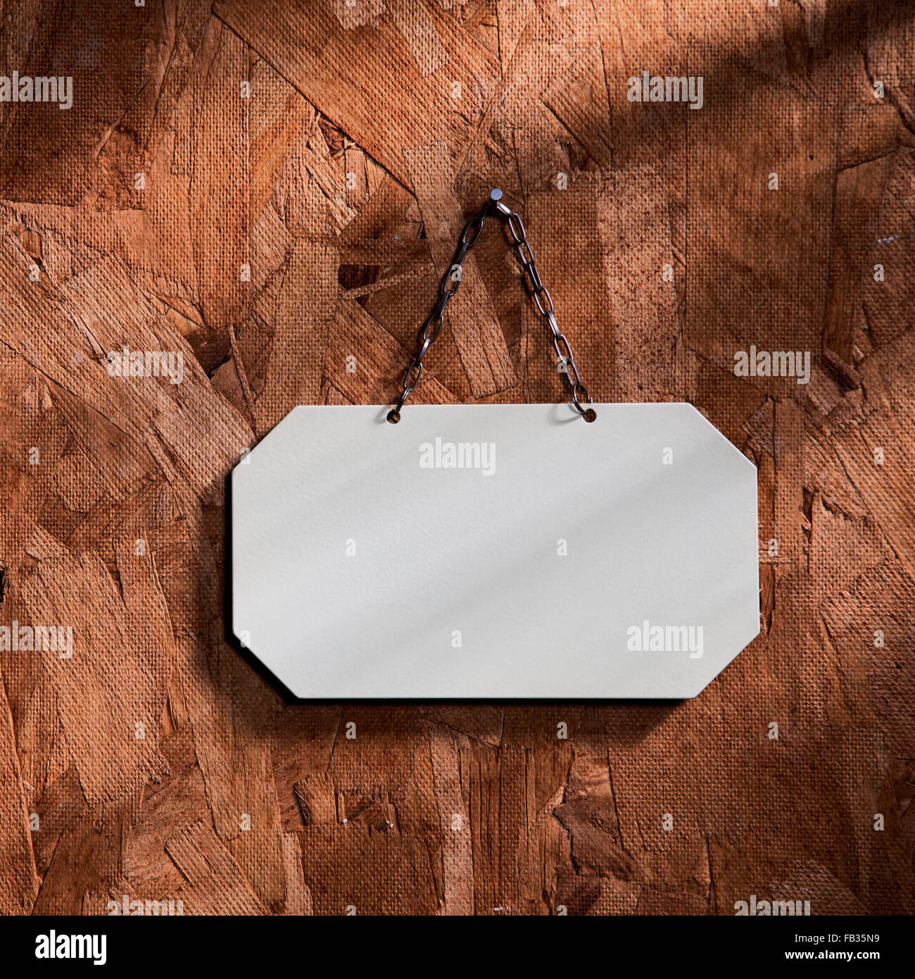metal signage with string on the texture wood Stock Photo - Alamy