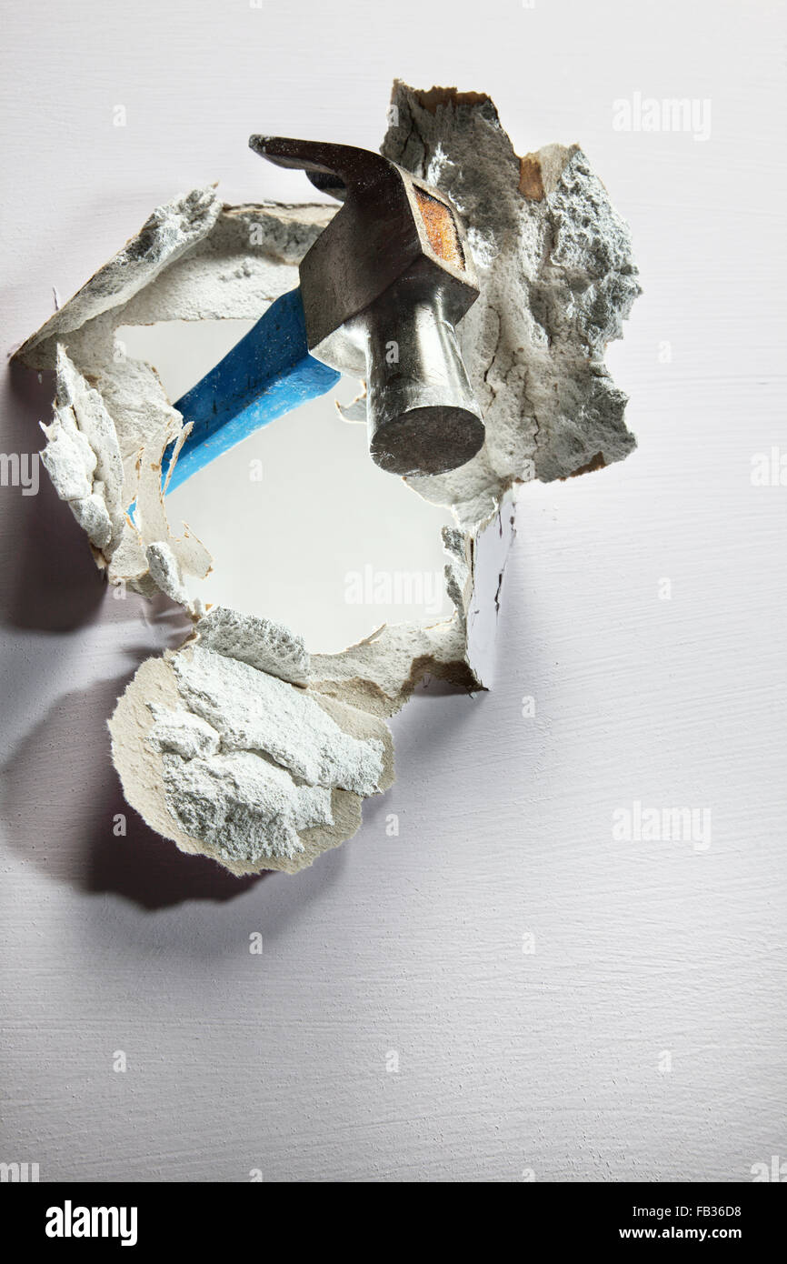 breaking or tear down a wall Stock Photo - Alamy