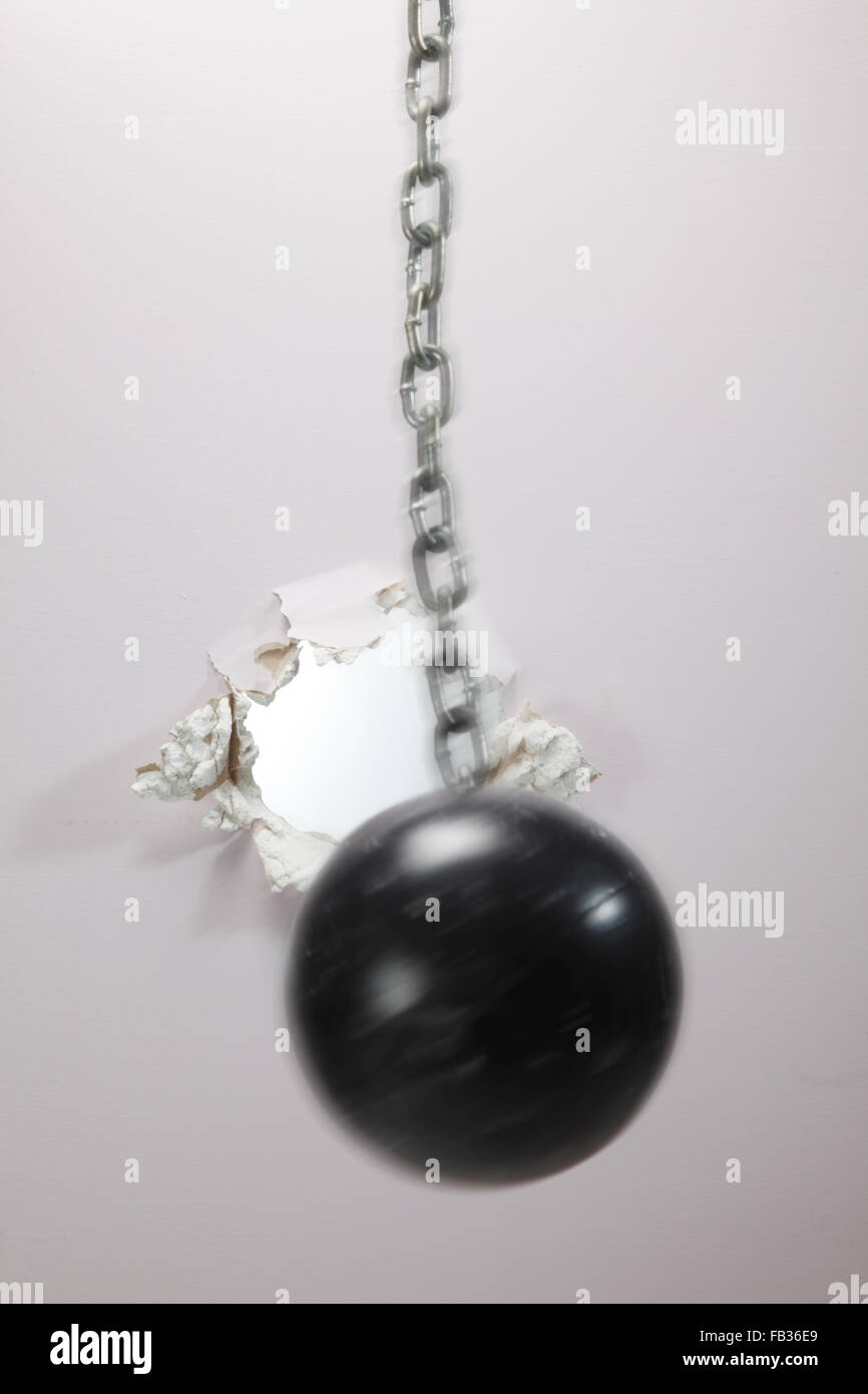 metal ball cracking down a wall Stock Photo - Alamy