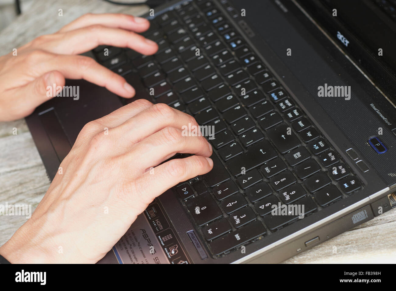 Person typing on a Laptop Stock Photo - Alamy