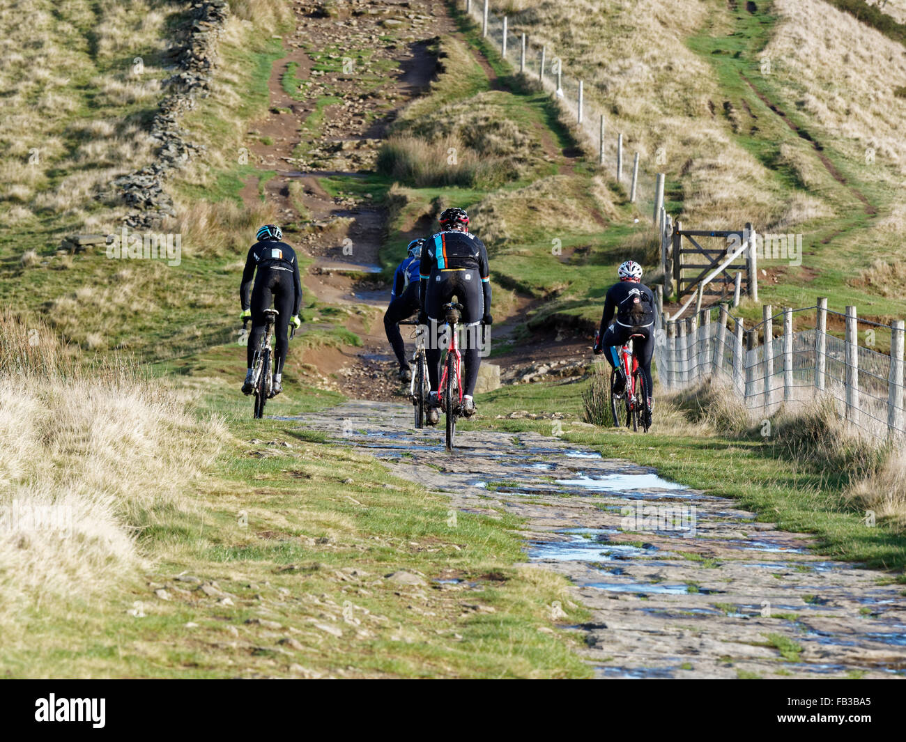 Cyclists on the Mam Tor path Stock Photo - Alamy