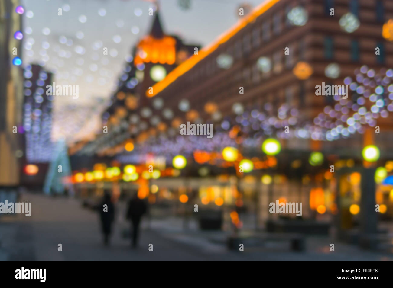Blurry background - evening illumination on European square in ...