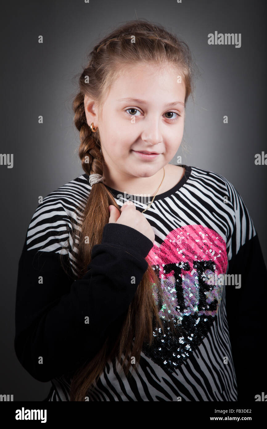 Portrait of a 10 year old girl, studio shot Stock Photo - Alamy