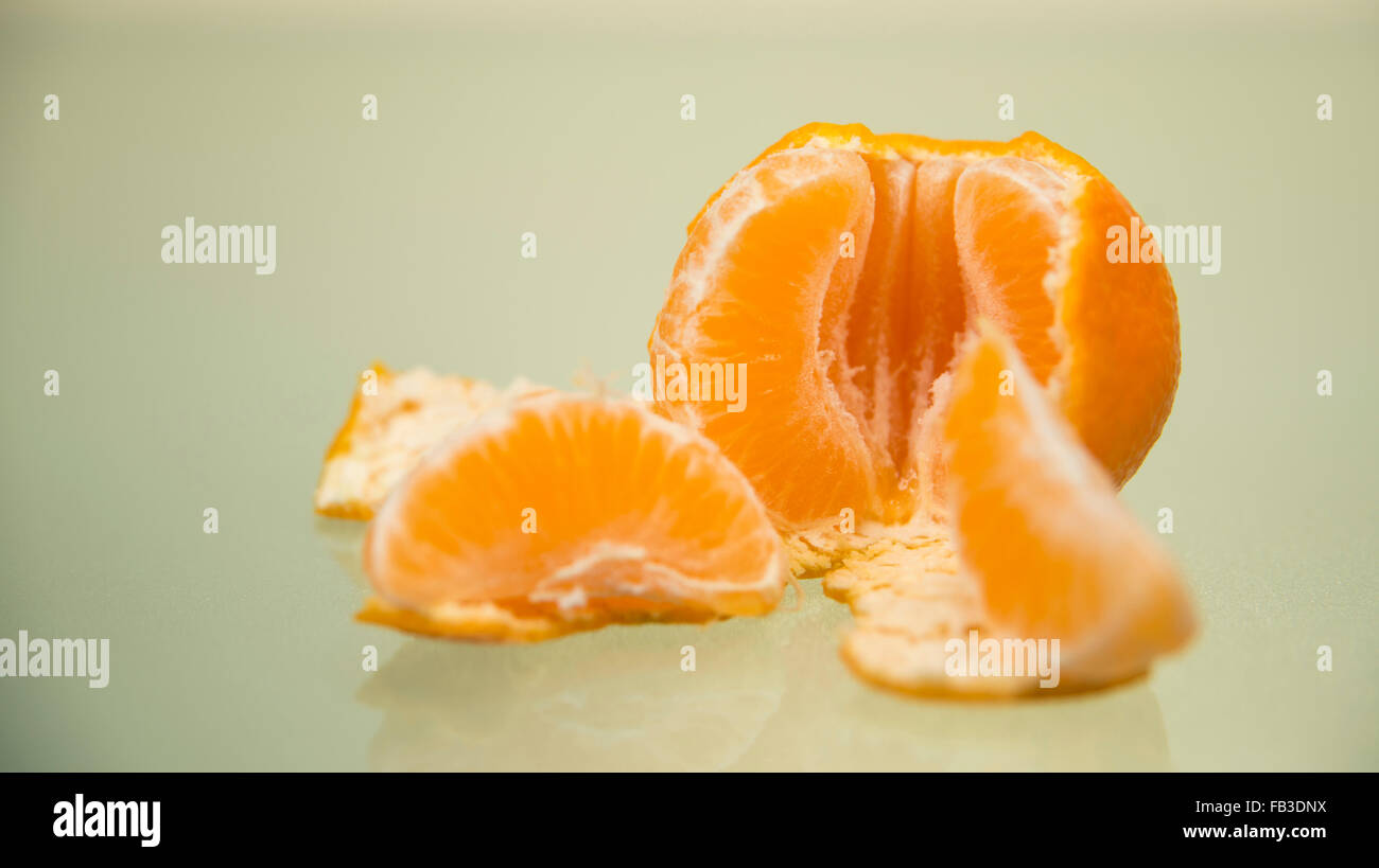 A peeled tangerine Stock Photo - Alamy