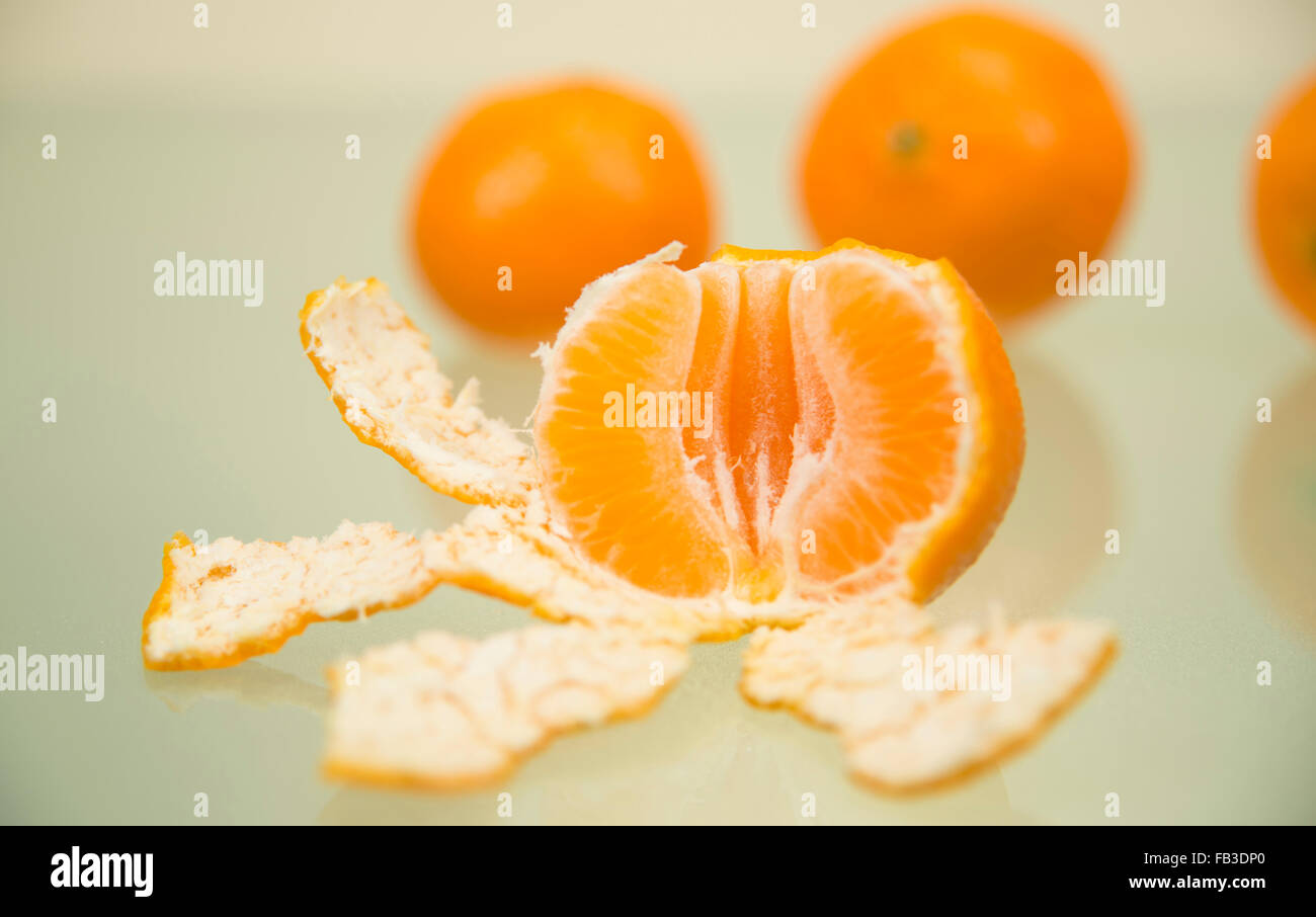 A peeled tangerine Stock Photo - Alamy