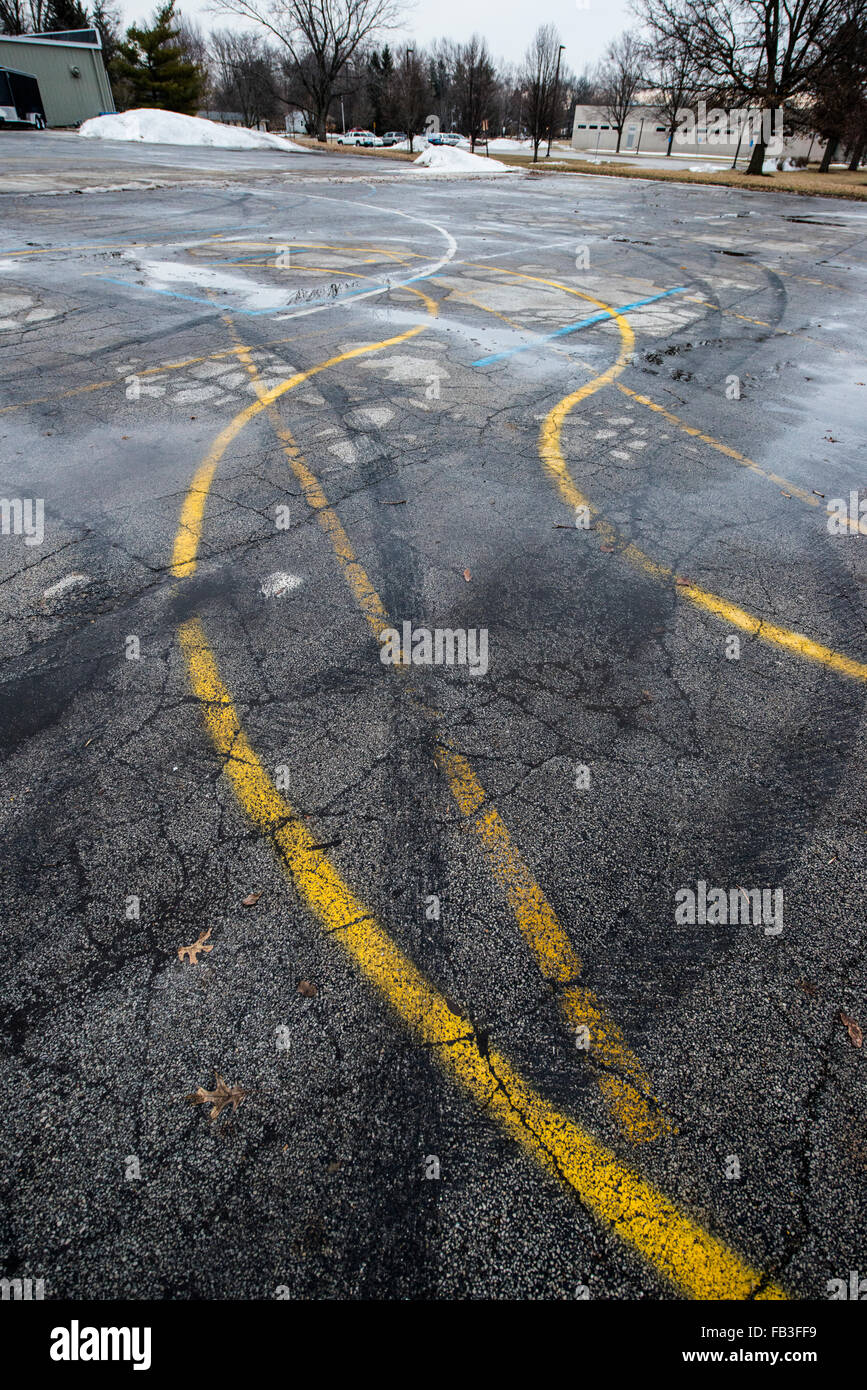 Interestingly painted yellow lines on asphalt Stock Photo - Alamy