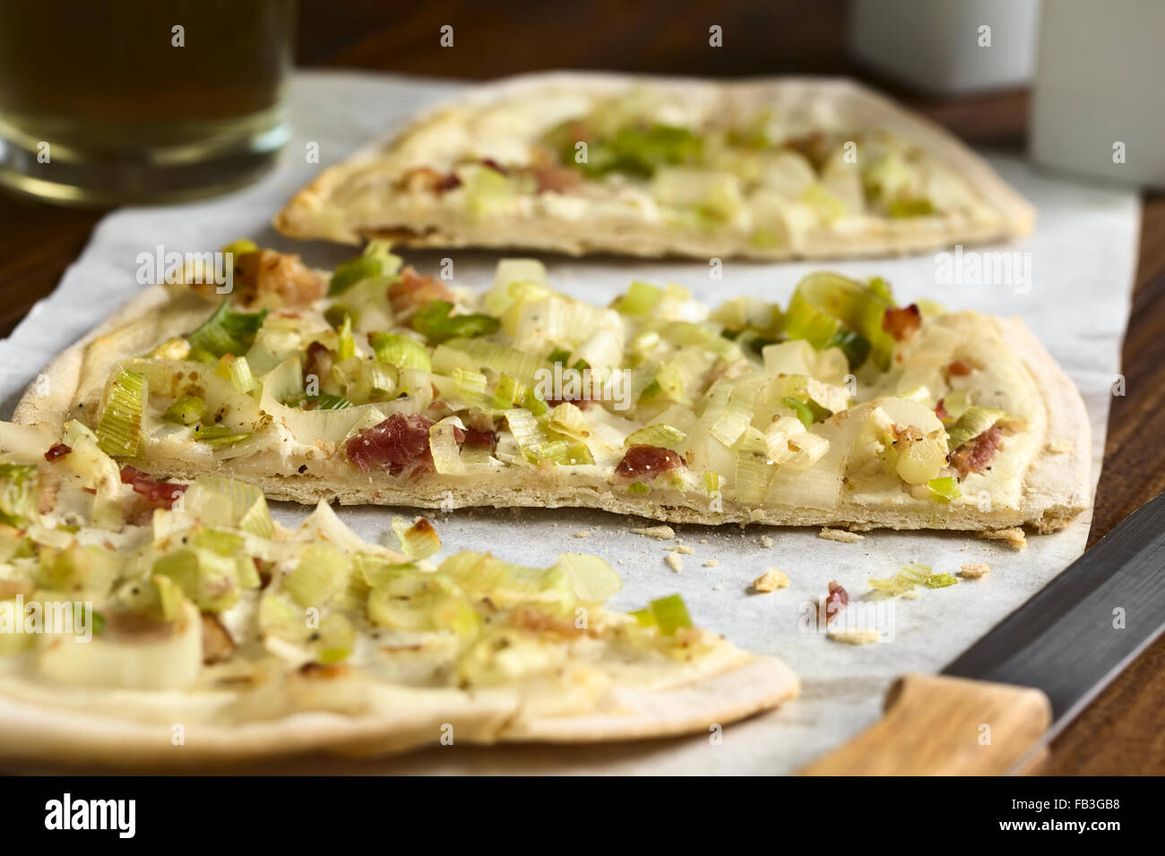 Homemade leek and bacon tarte flambee, a traditional French and German ...